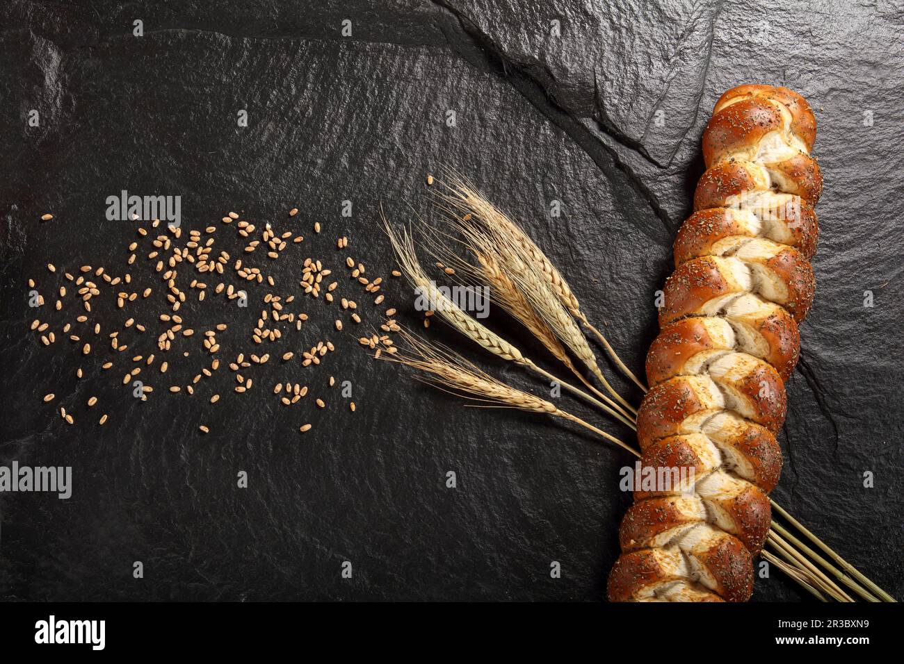 Braid next to cereal grains and wheat ears Stock Photo - Alamy