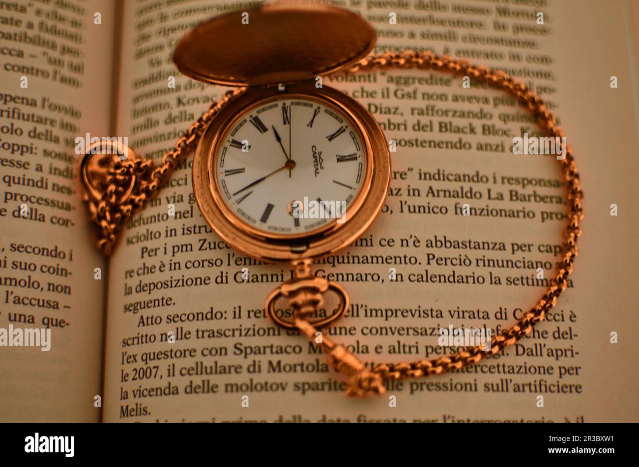 pocket watch an old memory the pages a book that narrate life Stock ...