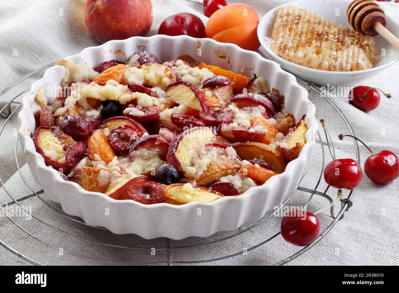 Baked fruit with crumble Stock Photo - Alamy