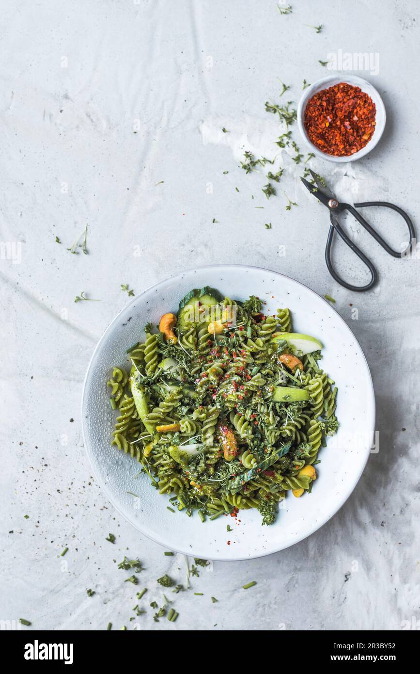 Spinach fusilli with herb mustard sauce Stock Photo - Alamy