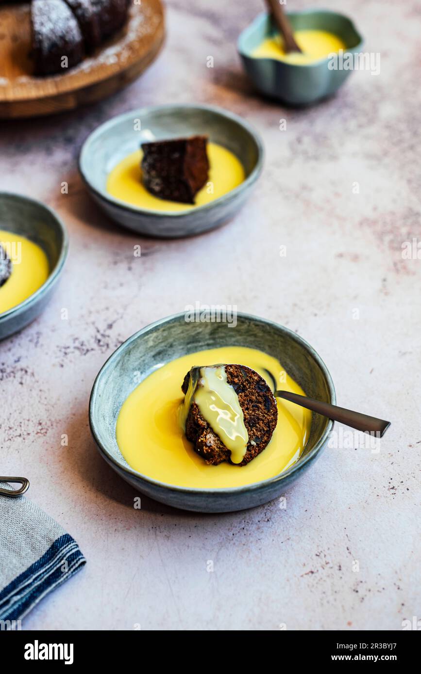 Chai Spiced Date Cake with Vanilla Custard Stock Photo - Alamy