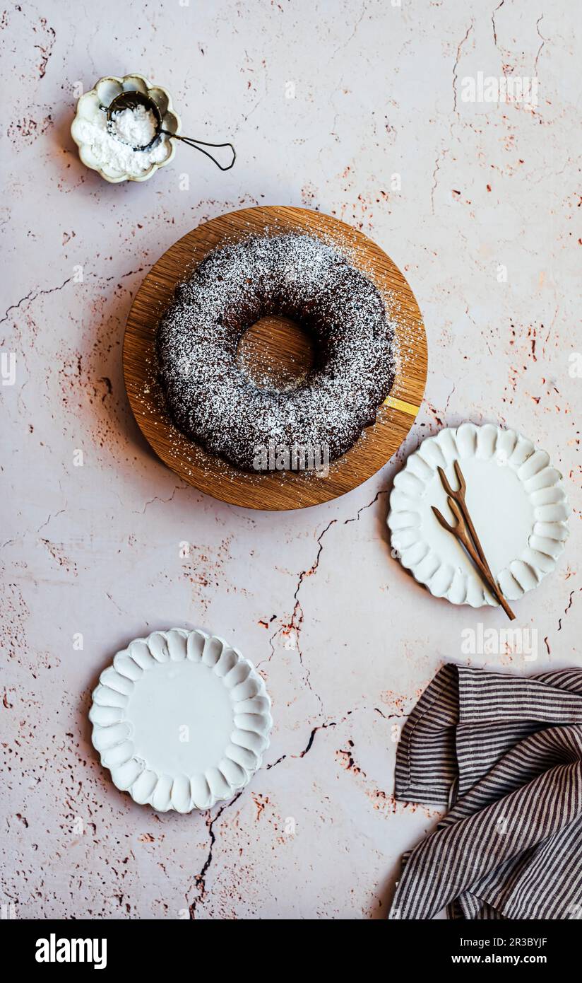 Chai Spiced Date Cake with Icing Sugar Dusting Stock Photo - Alamy