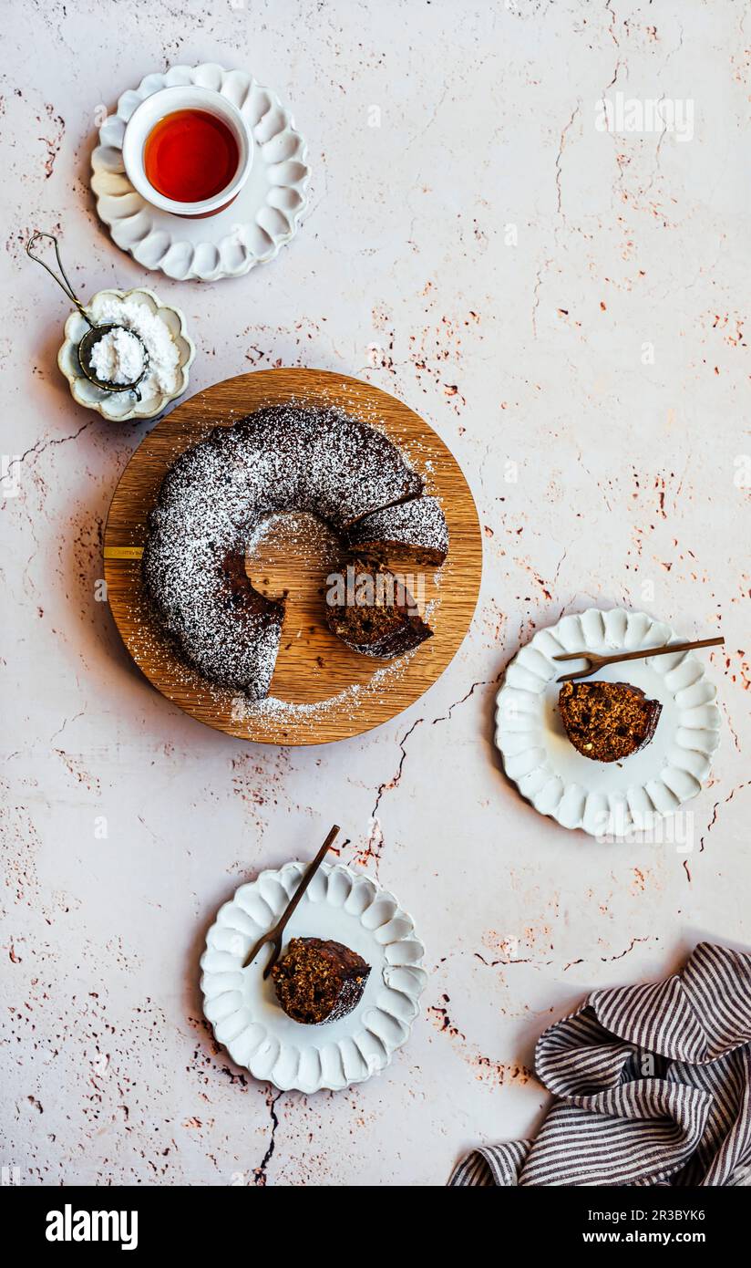 Slices of Chai Spiced Date Cake with Icing Sugar Dusting Stock Photo ...