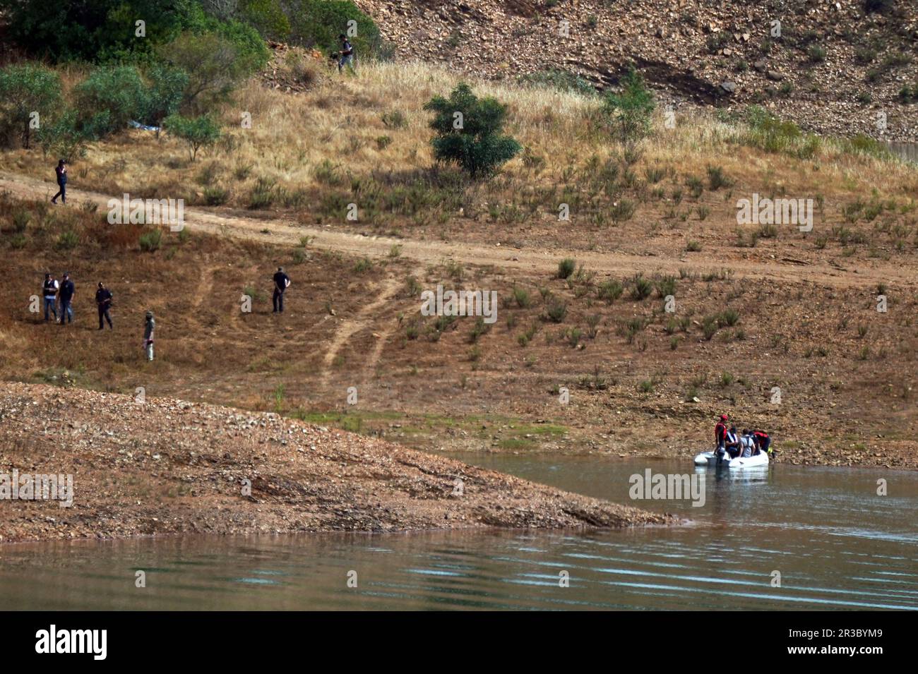 Personnel at Barragem do Arade reservoir, in the Algave, Portugal, as ...