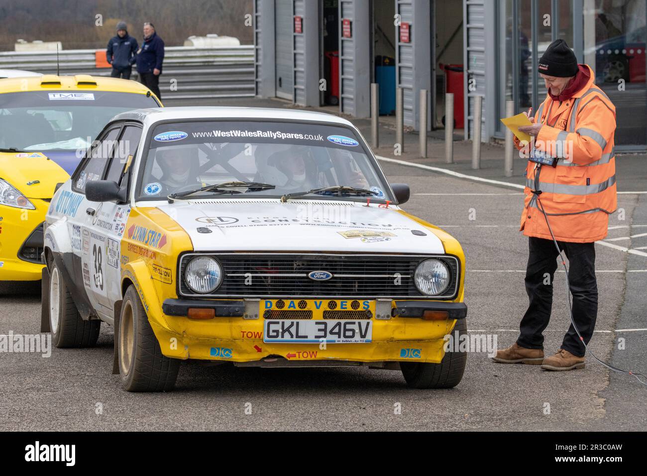 David Large and David Ottoway in their Ford Escort Mk2 with the control ...