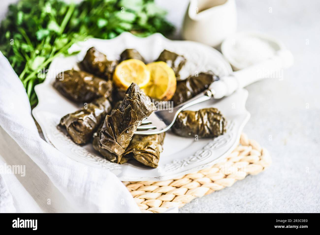 Traditional Georgian grape leaves wraped tolma Stock Photo - Alamy