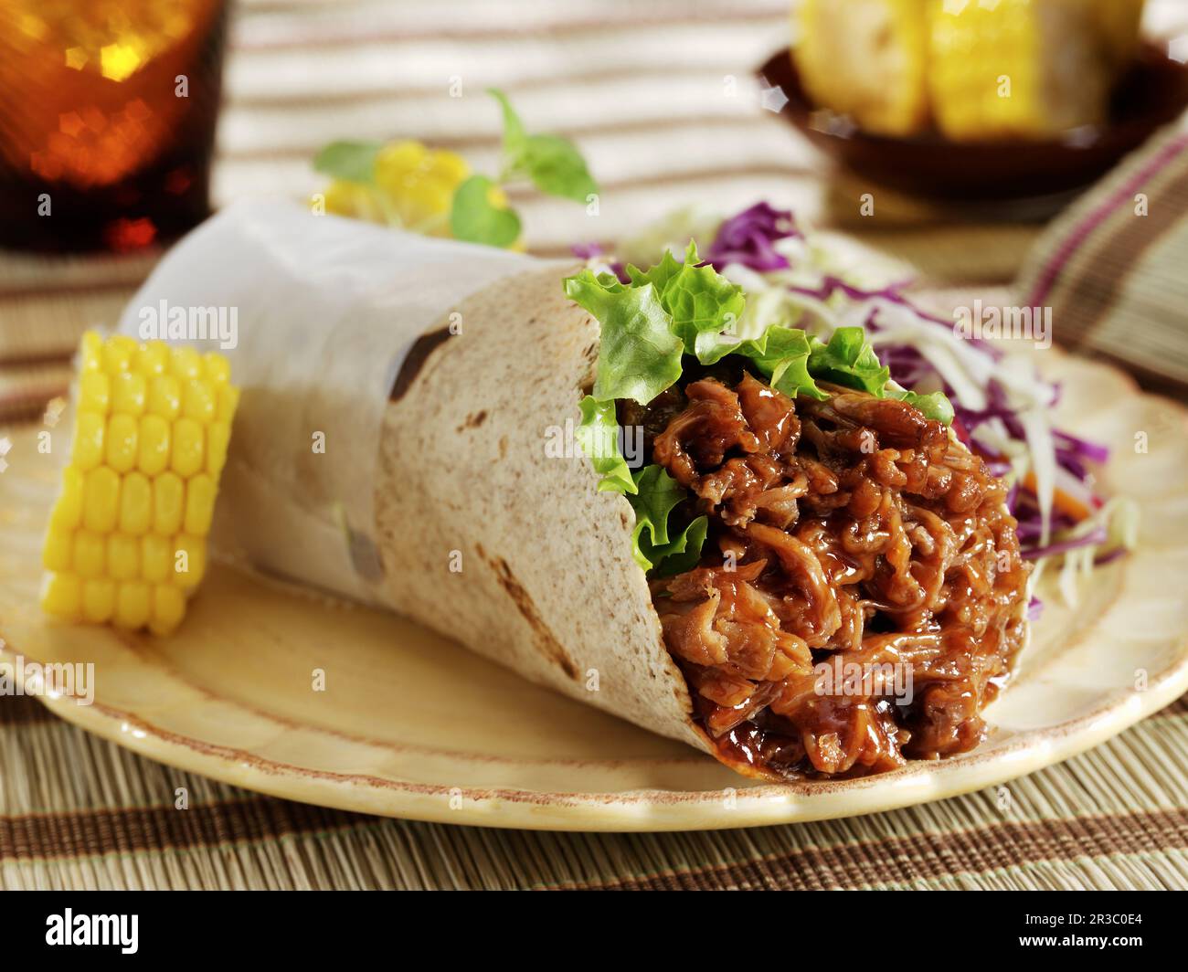 Shredded BBQ beef in grain tortilla wrap with corn and cole slaw Stock ...