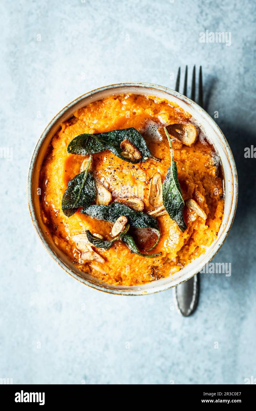 Sweet potato puree with sage-garlic butter Stock Photo - Alamy