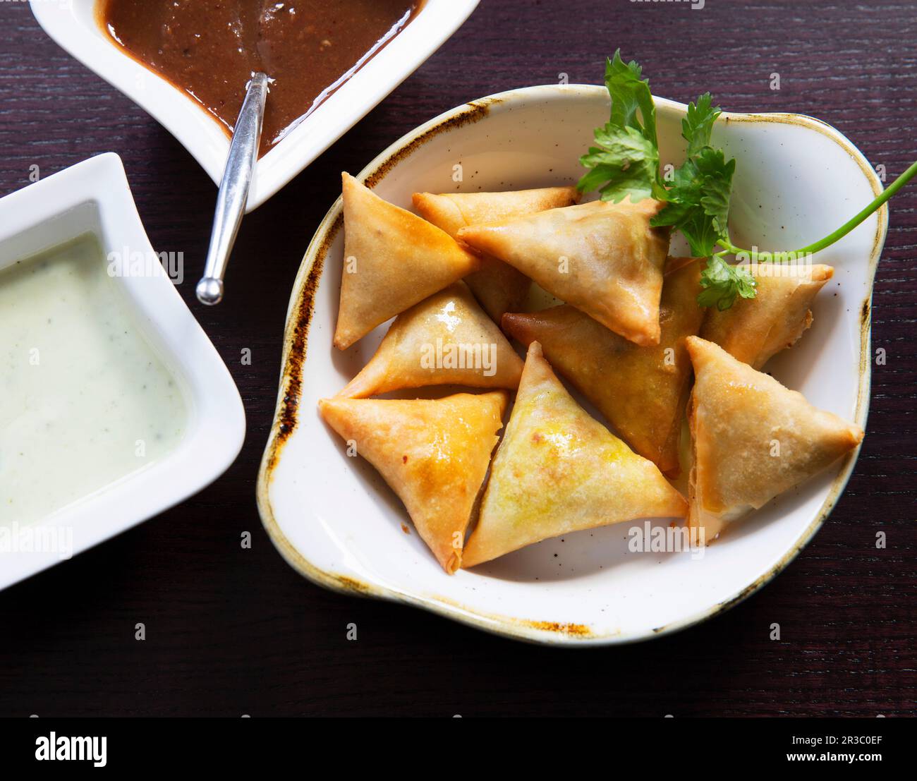 Samosas with lentils and lamb Stock Photo - Alamy