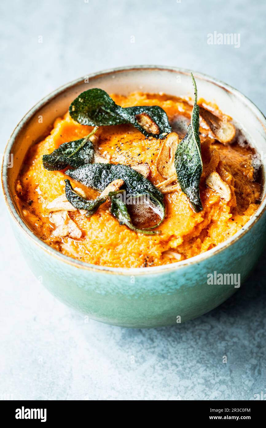 Sweet potato puree with sage-garlic butter Stock Photo - Alamy