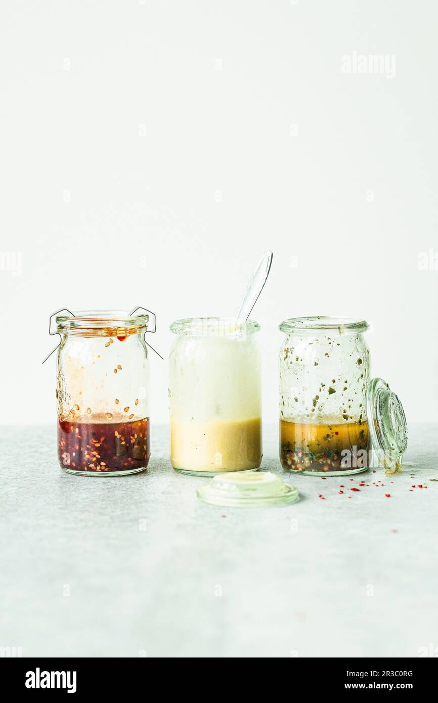 Three different salad dressings Stock Photo - Alamy