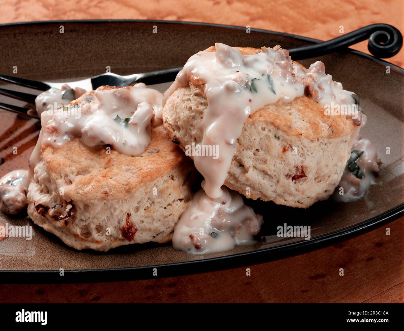 Classic Southern Biscuits and Sausage Gravy Stock Photo - Alamy