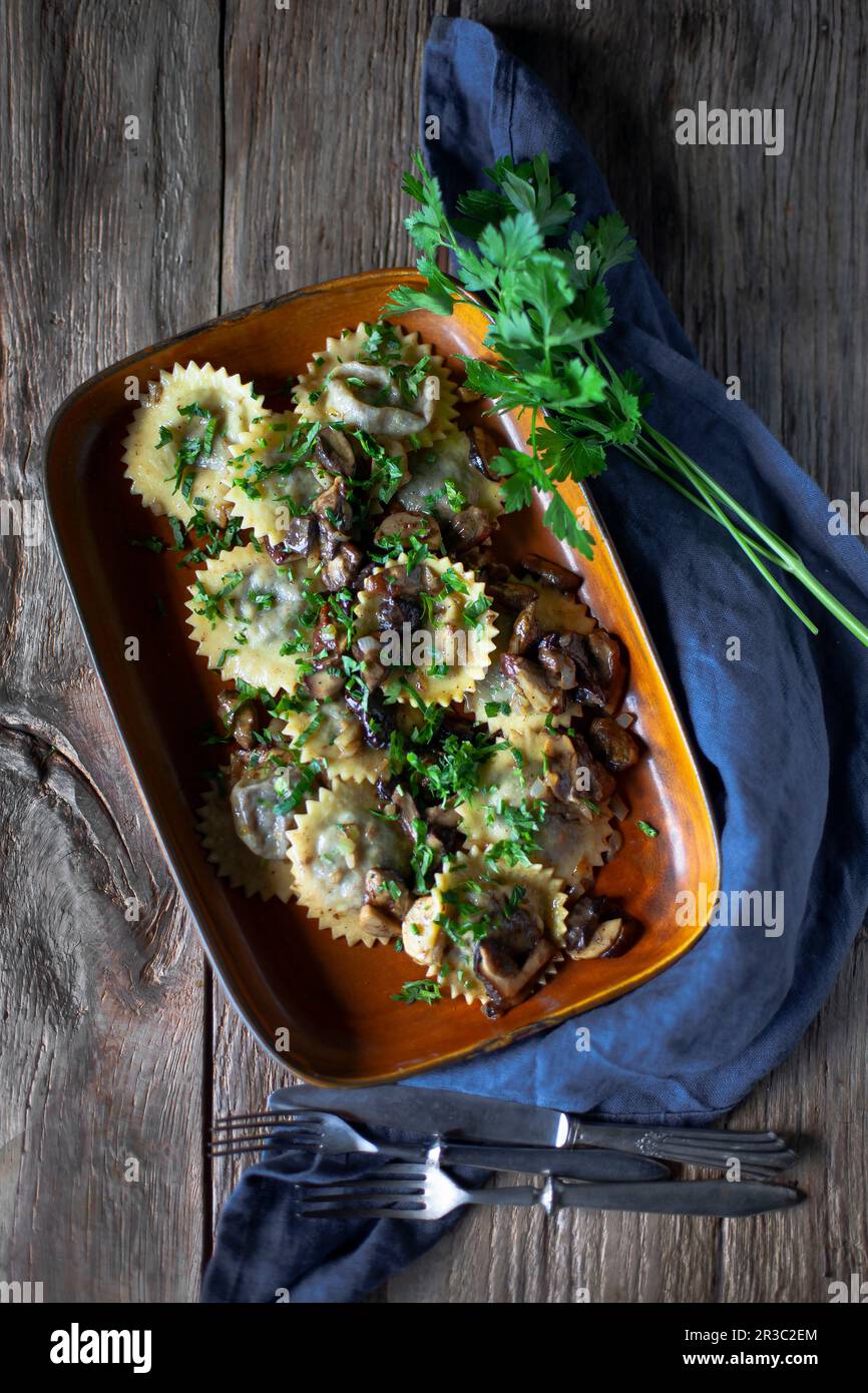 Ravioli with mushroom sauce hi-res stock photography and images - Alamy