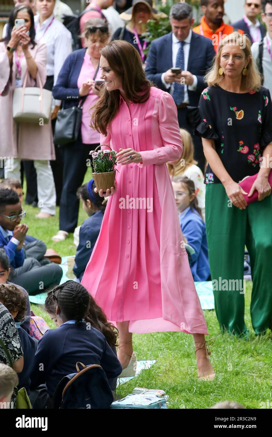 Catherine, Princess of Wale walks around with a basket of flowers ...
