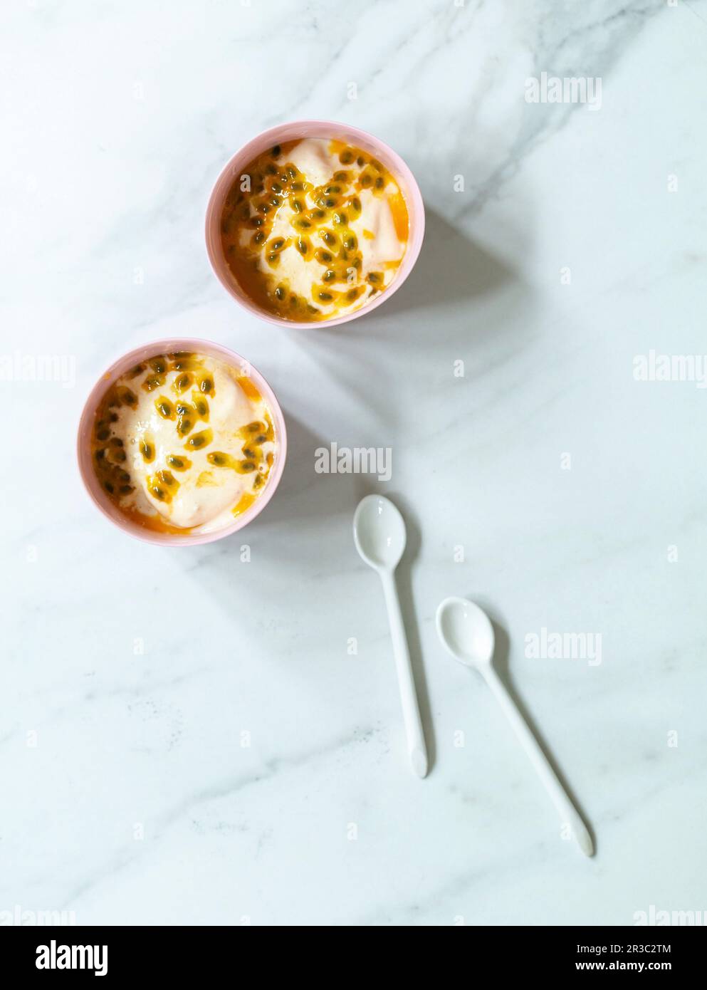 Banana cream with passion fruit Stock Photo - Alamy