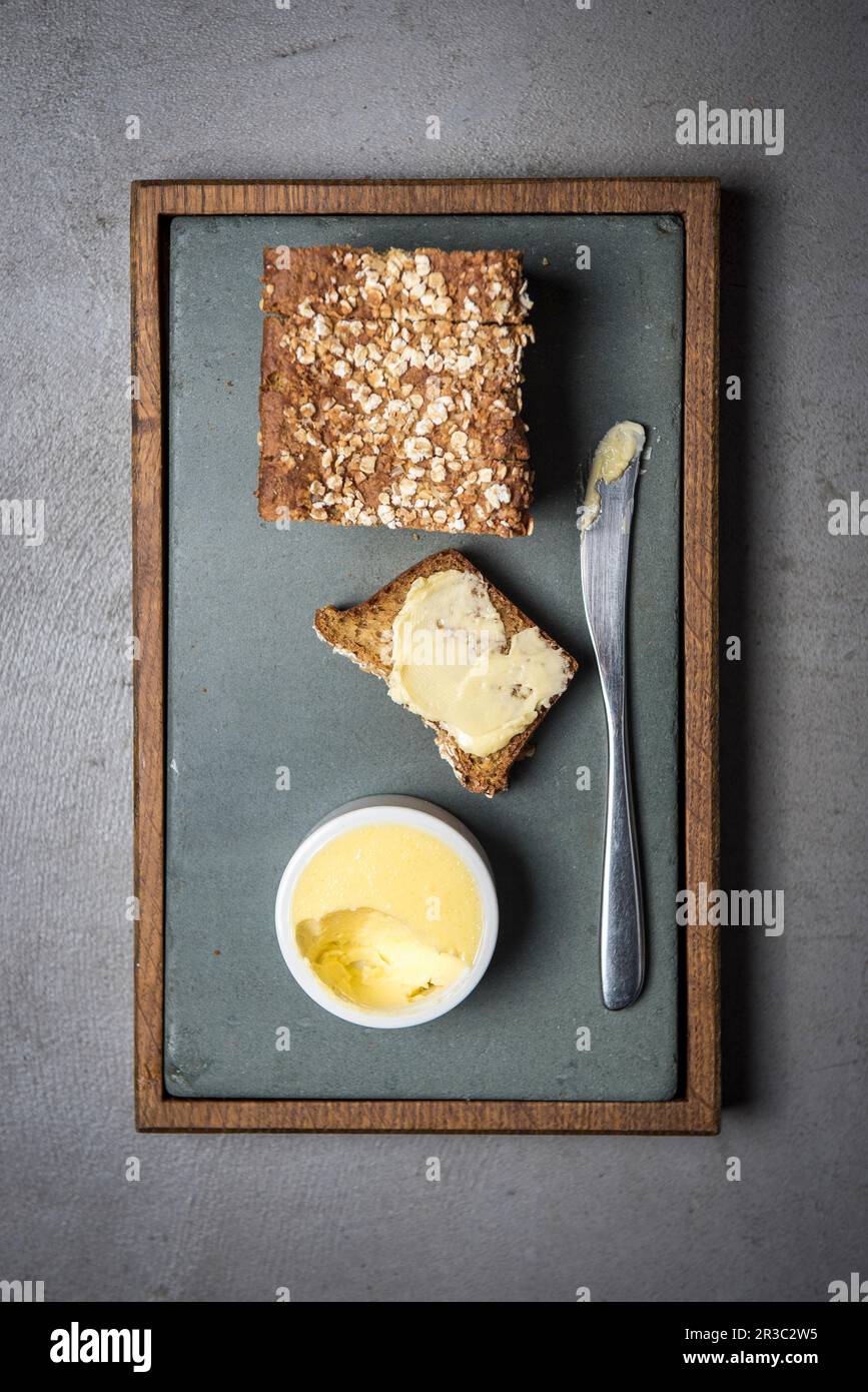 Handmade loaf of bread with butter Stock Photo - Alamy