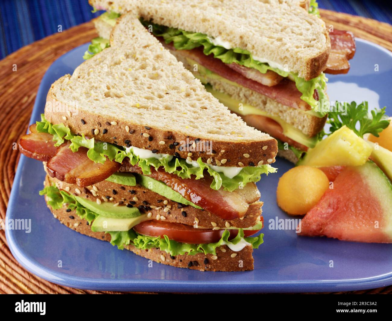 BLT - bacon, lettuce, tomato and avocado club sandwich on whole grain ...