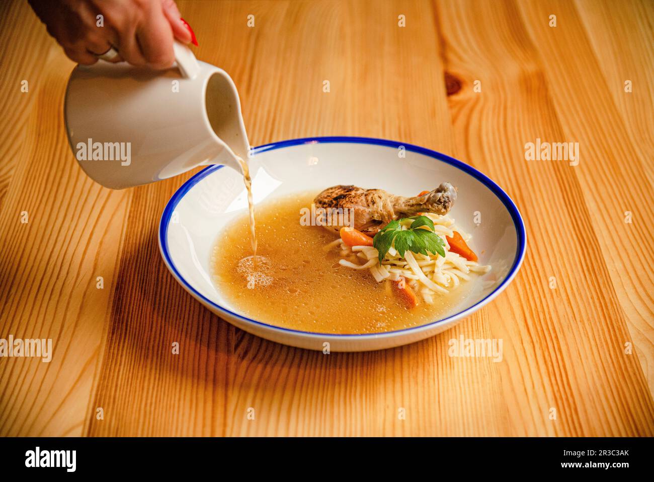 Plain chicken soup hi-res stock photography and images - Alamy