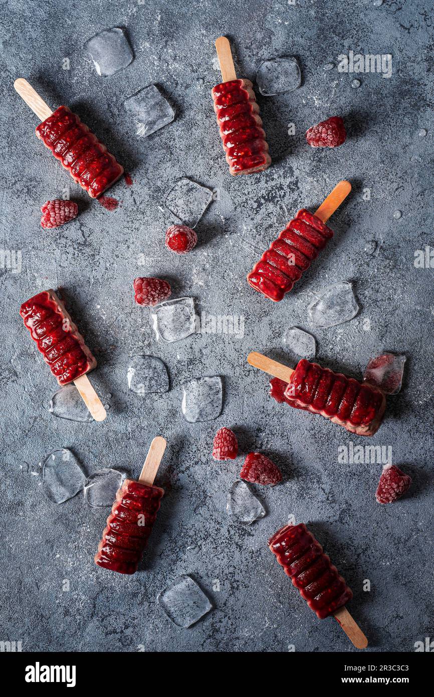 Chocolate raspberry ice cream on sticks Stock Photo - Alamy