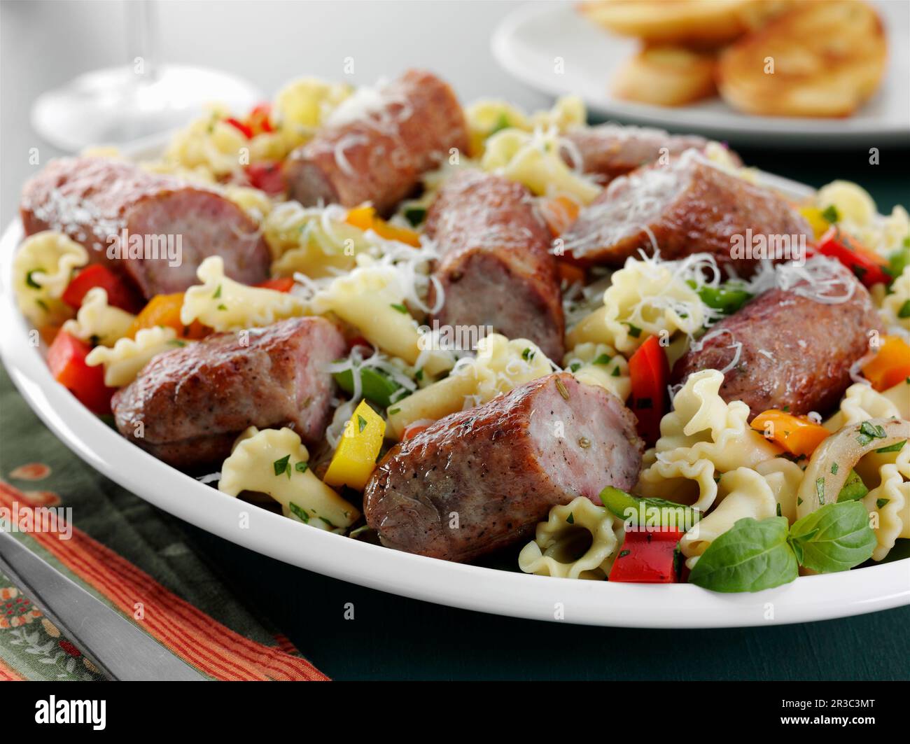 Classic Italian dinner of sweet sausage, tri color bell peppers and ...