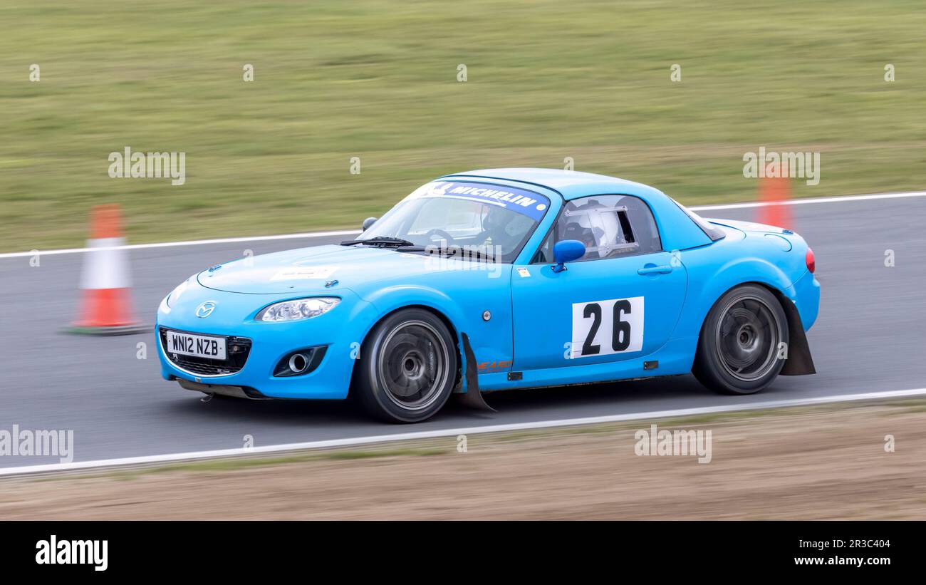 Steve Dolman and Julia Perry in their 2012 Mazda MX-5 during the 2023 ...