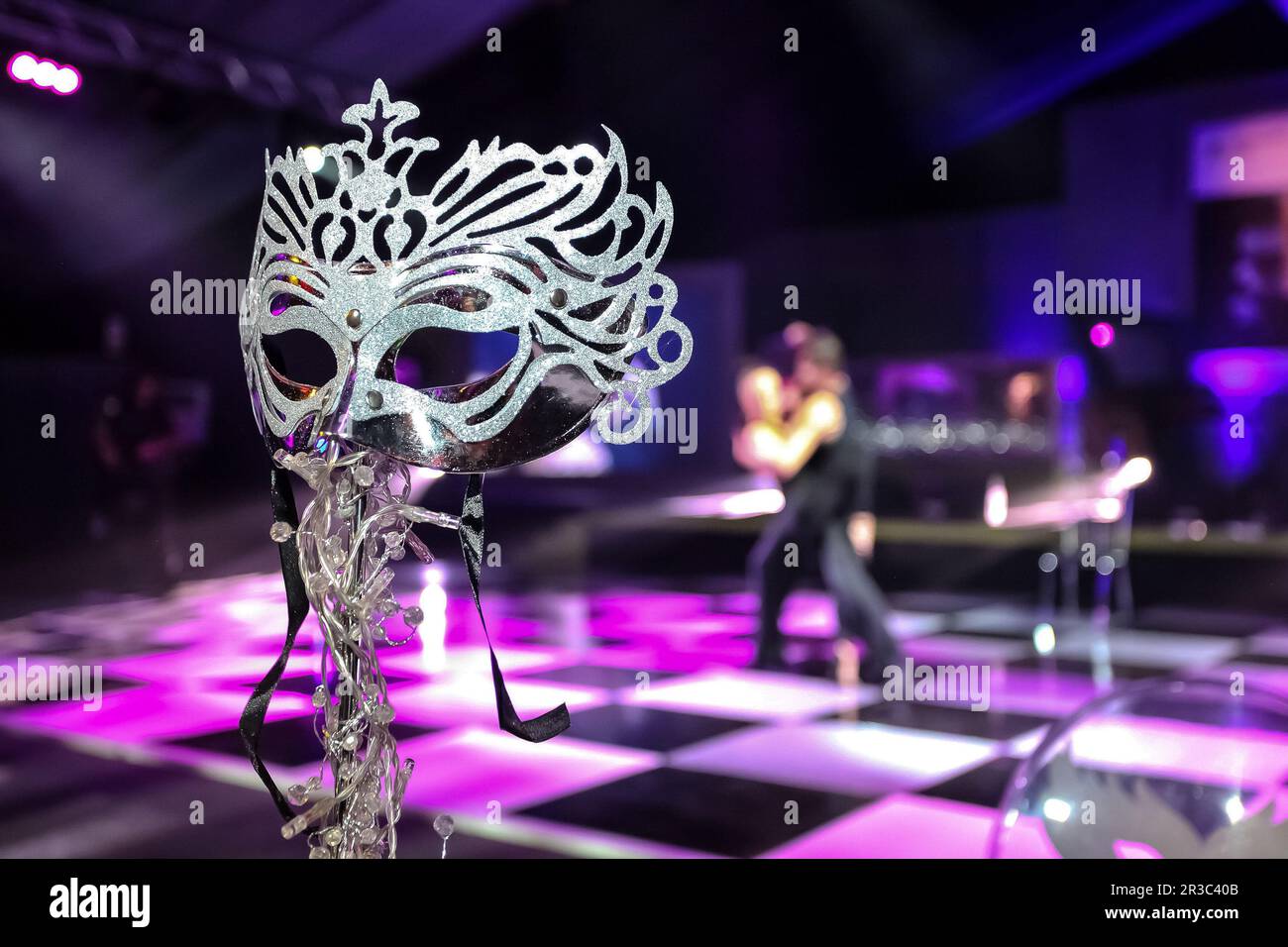 Masquerade Mask at corporate event or gala dinner Stock Photo - Alamy