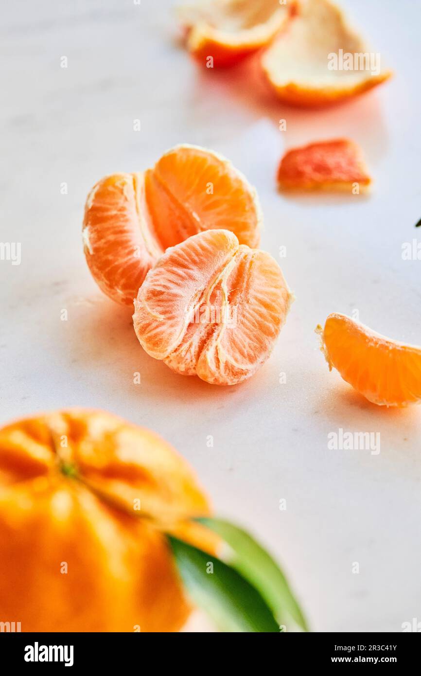 Tangerine pieces hi-res stock photography and images - Alamy