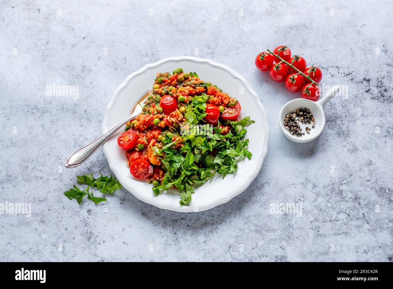 Tomato rice with peas Stock Photo - Alamy