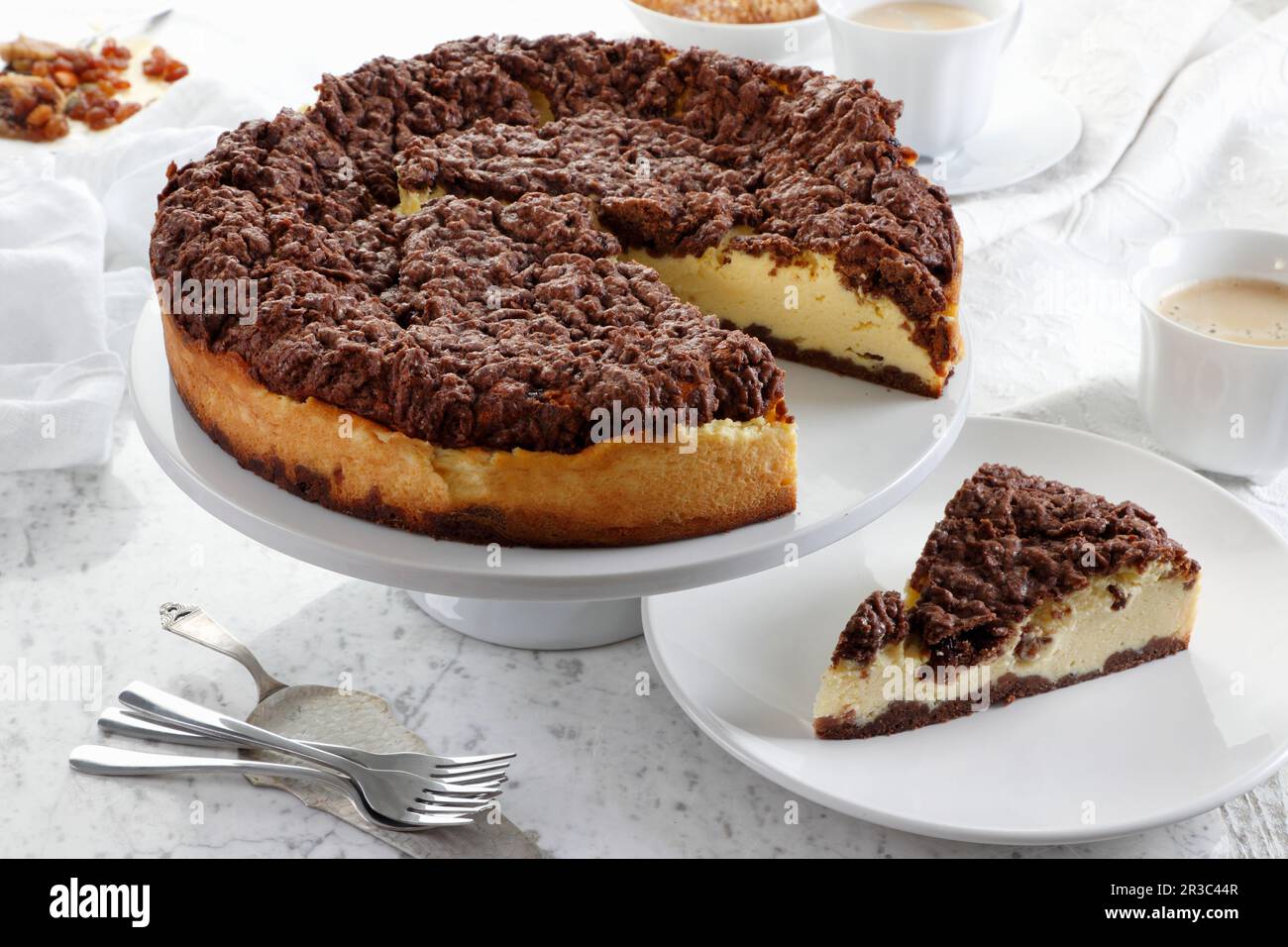 Cheesecake with chocolate crumble Stock Photo - Alamy