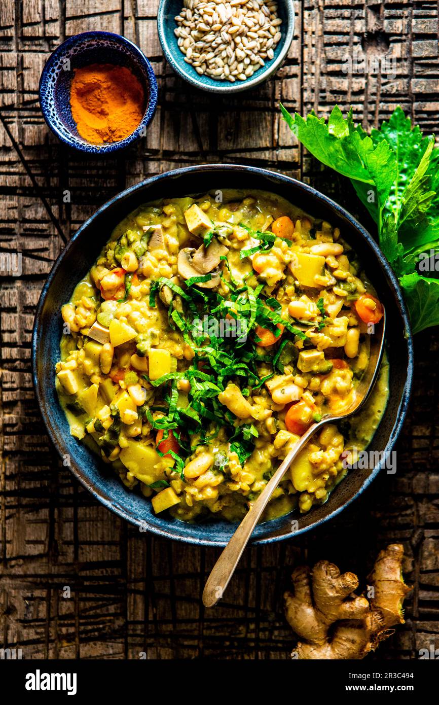 Ritschert with curry - alpine rolled barley stew Stock Photo - Alamy
