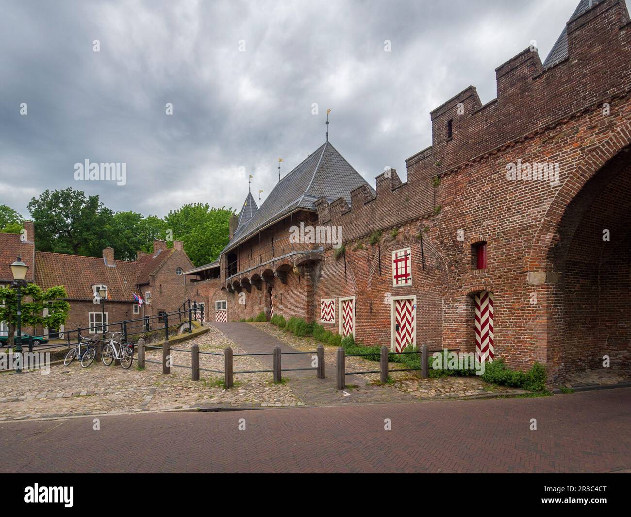 The southeast facade of the Koppelpoort medieval gatehouse in the Dutch ...