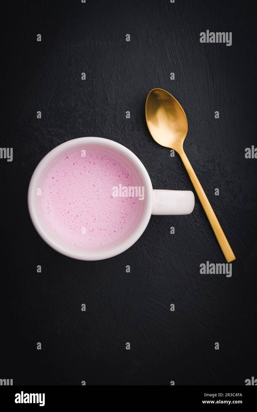 Moon Milk with beet powder Stock Photo - Alamy