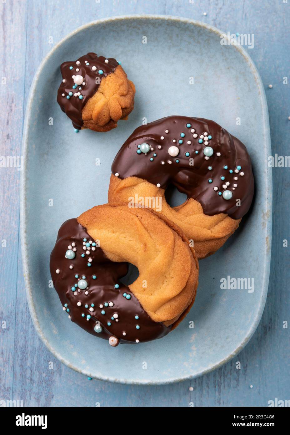 Vegan shortbread biscuits with raspberry jam, plain icing and sugar ...