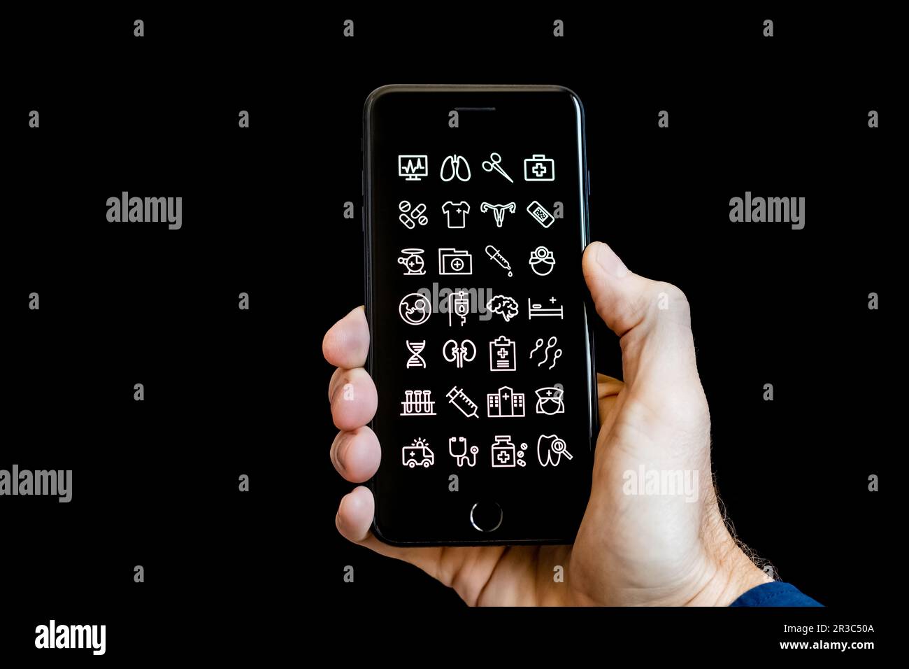 Hand Holding a Smartphone with Health and Medical Icon Apps on the ...