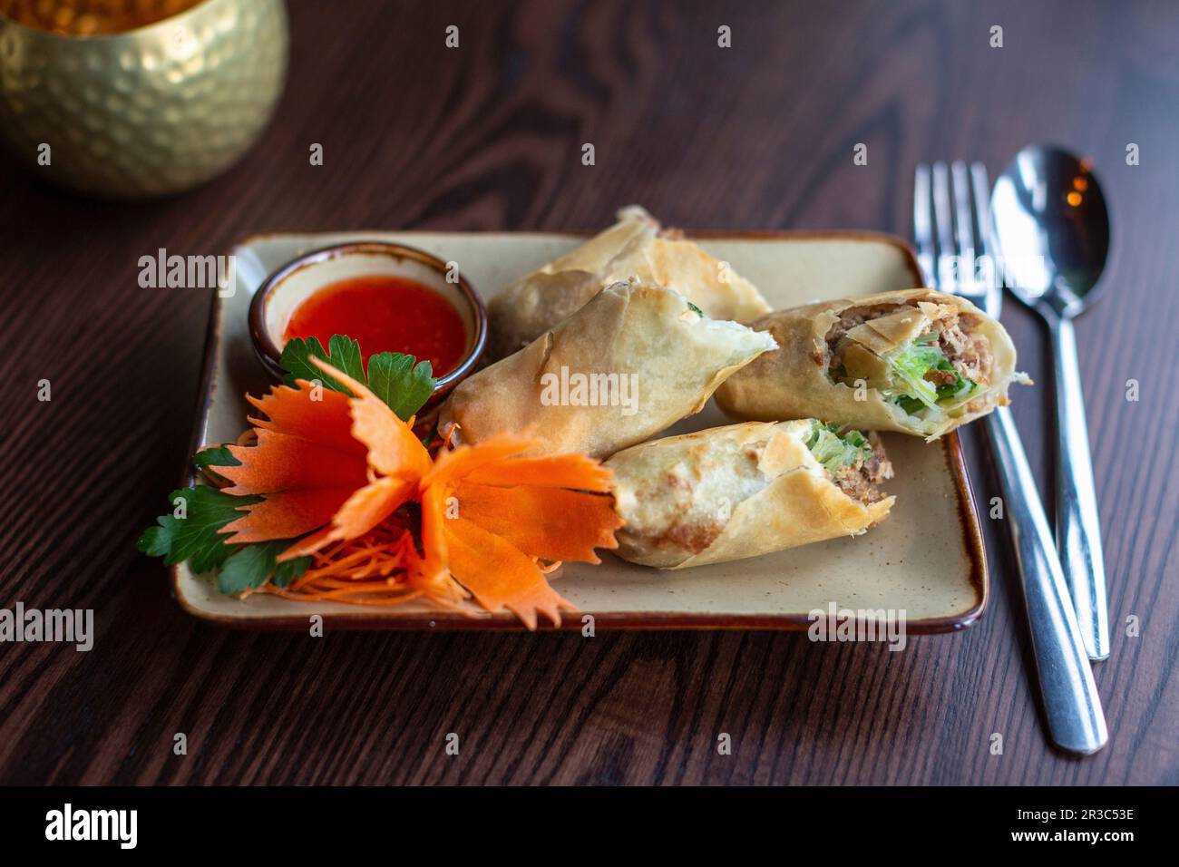 Asian spring rolls frying in hi-res stock photography and images - Alamy