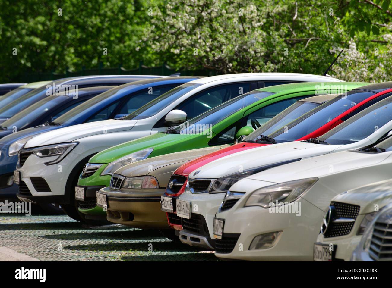 Moscow, Russia - 17 May. 2021. Row of cars parked along road Stock ...