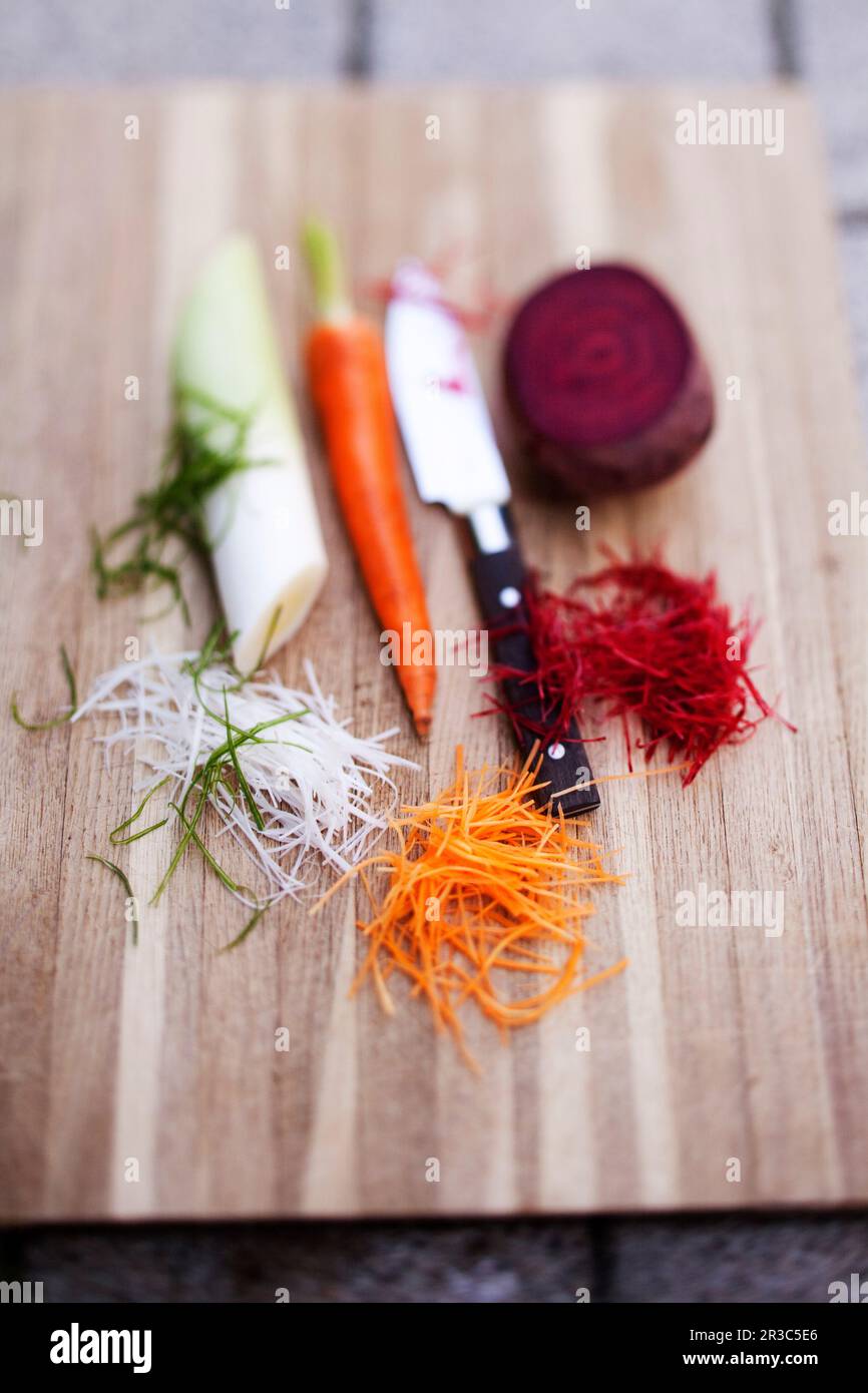Julienne of leek, carrot and beetroot Stock Photo - Alamy