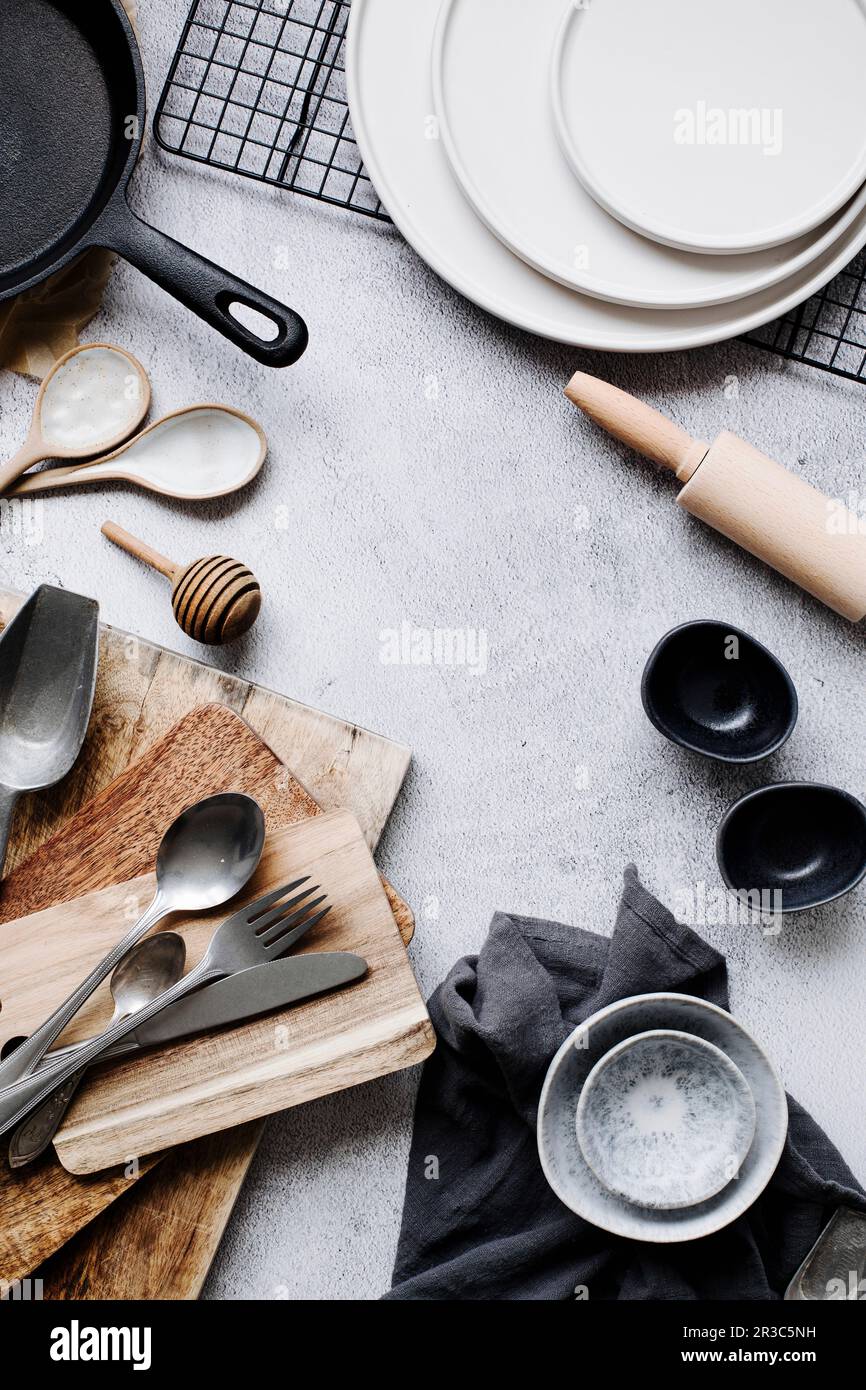 Baking utensils, cutlery, and plates Stock Photo - Alamy