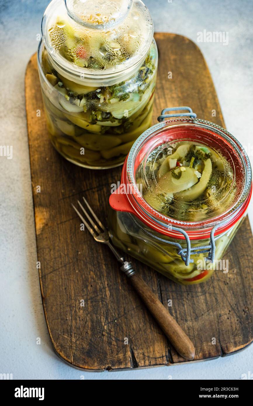 Fermented green tomato vegetables and spices Stock Photo - Alamy