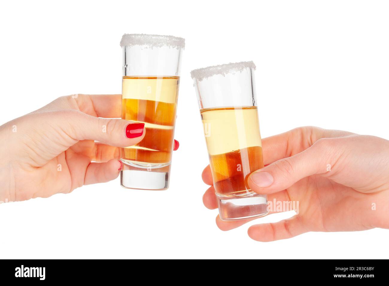 Two hands clinking glasses with shot cocktail isolated on white Stock ...