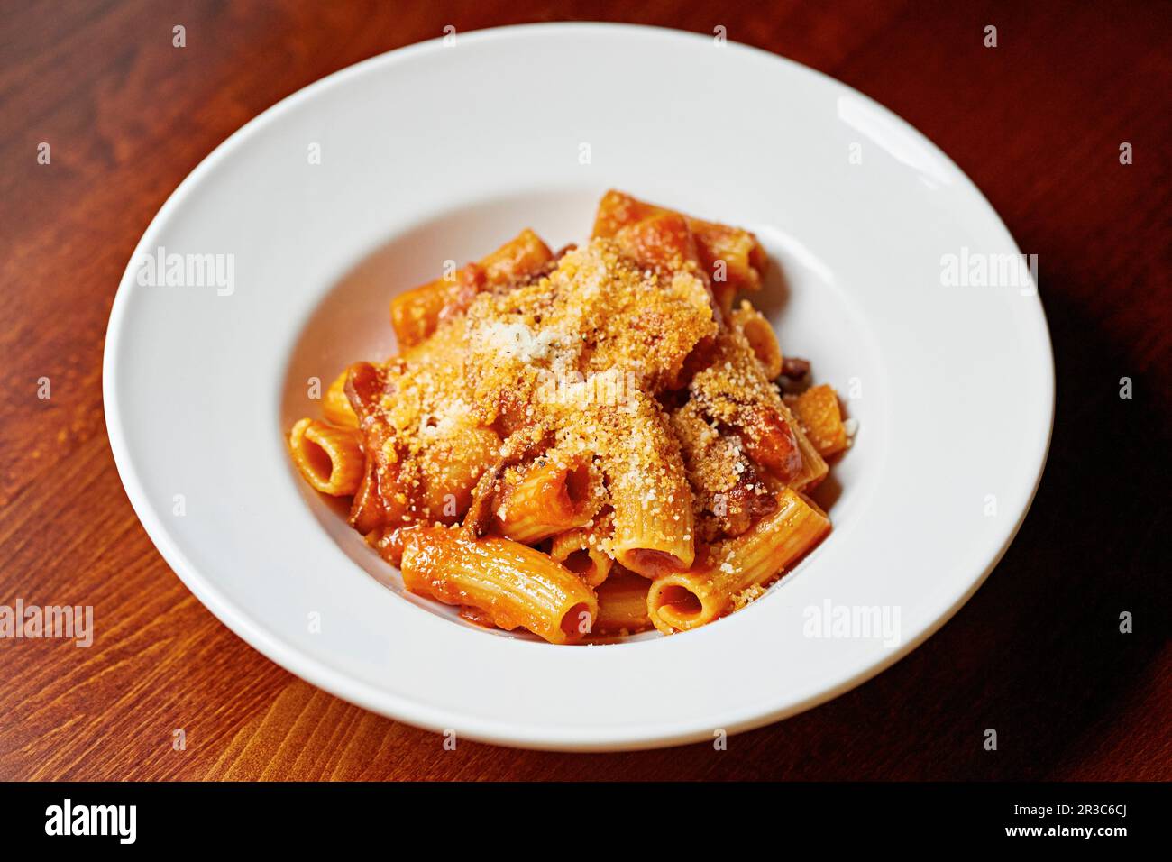 Rigatoni with Ragu and parmesan Stock Photo - Alamy
