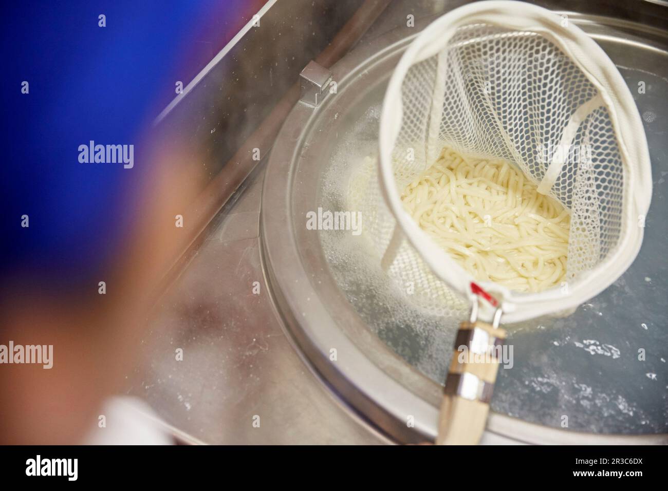 Chef boiling water in hi-res stock photography and images - Alamy