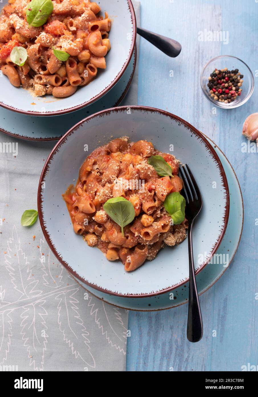 Vegan wholemeal spelt pasta with tomato and chickpea sugo Stock Photo ...