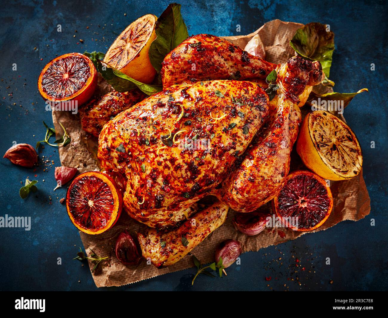 Roast chicken with herbs and citrus fruits Stock Photo - Alamy