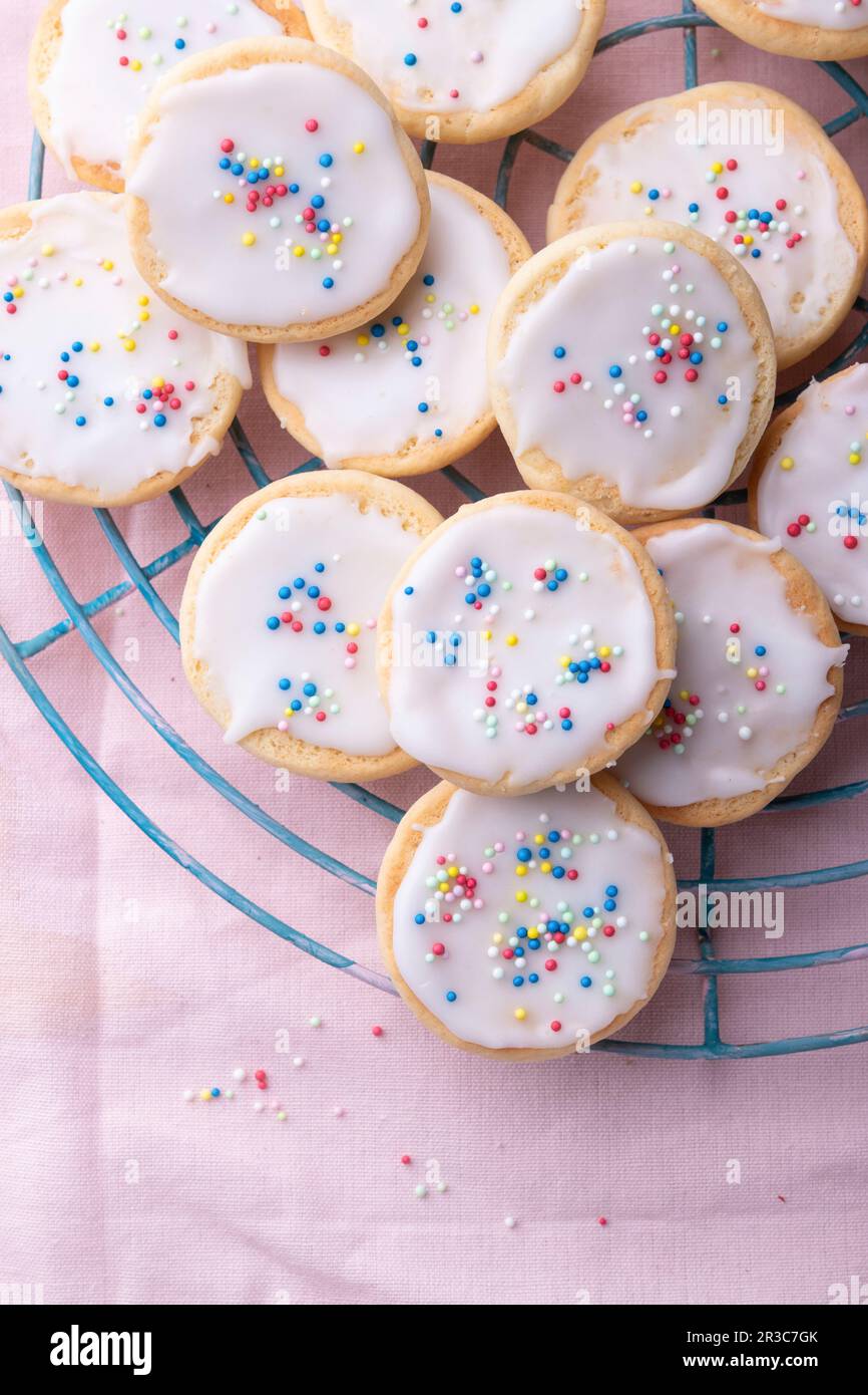 Vegan mini frosted sugar cookies with sugar pearls Stock Photo - Alamy