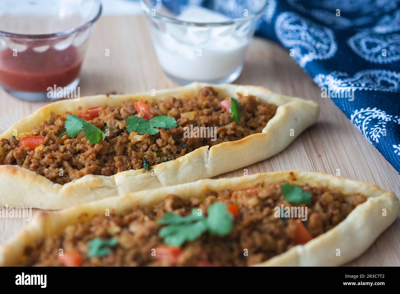 Turkish Pide with minced chicken Stock Photo - Alamy