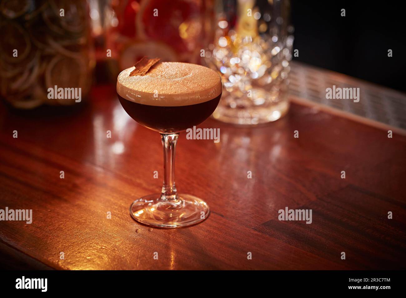 Espresso martini cocktail on a bar Stock Photo - Alamy