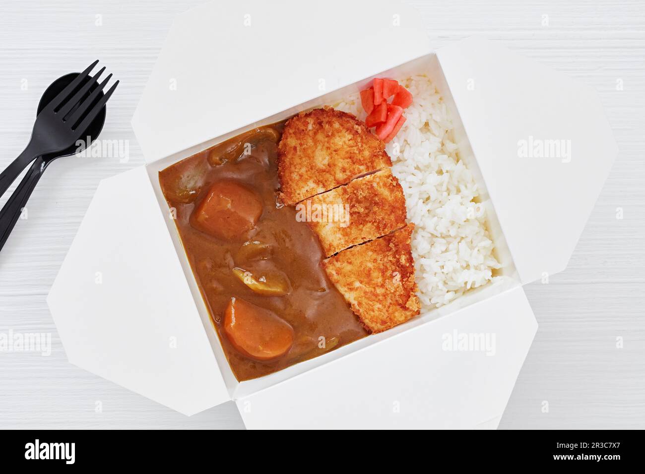 Chicken katsu curry in a take away white box Stock Photo - Alamy