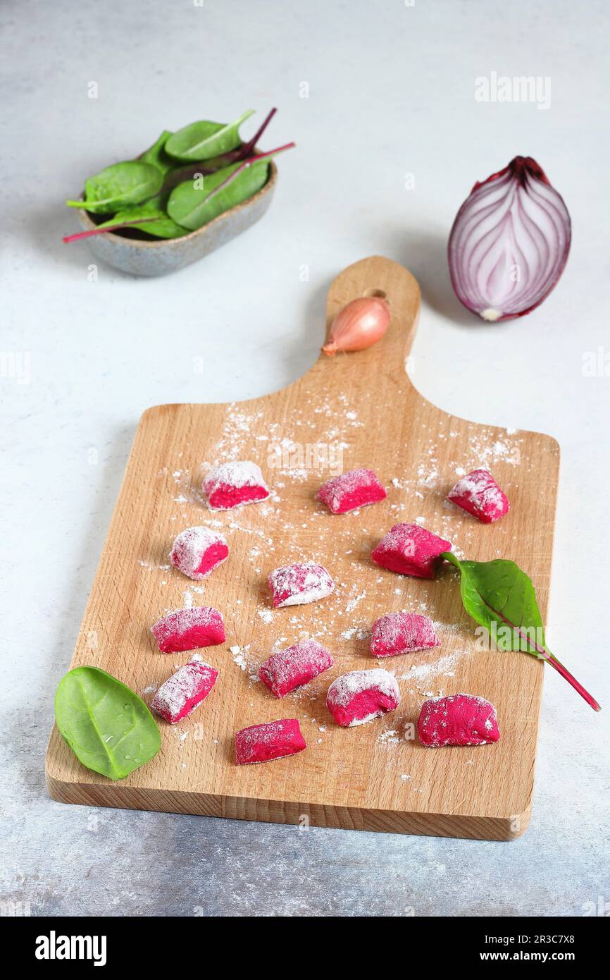 Homemade beet gnocchi Stock Photo - Alamy