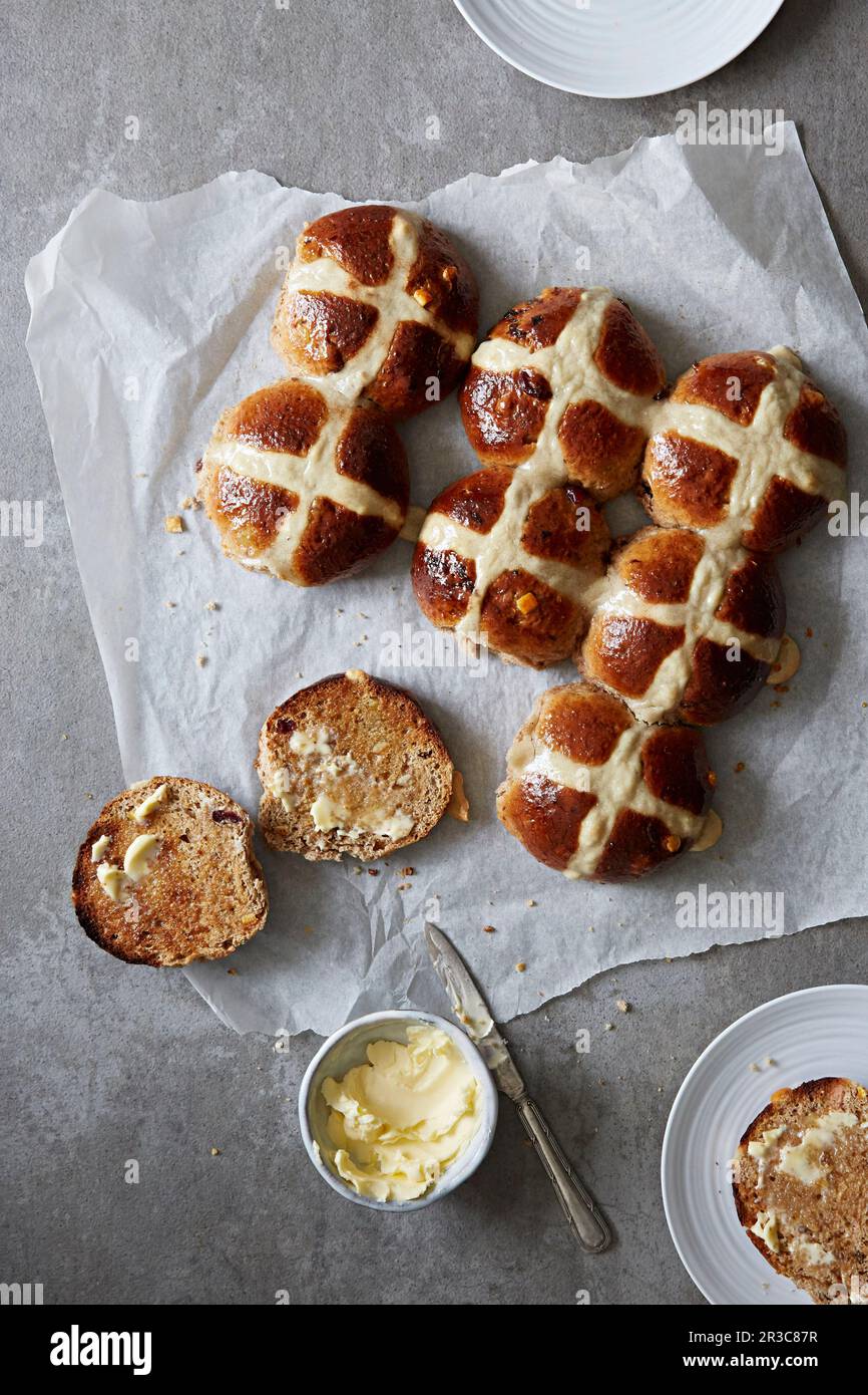 Hot cross buns and melting butter Stock Photo - Alamy